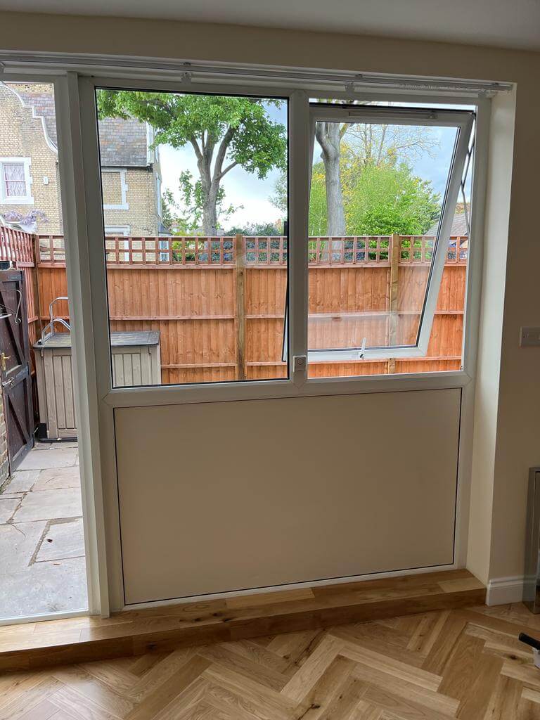Installing glass into a solid panel | Glazier in Loughton, Essex ...